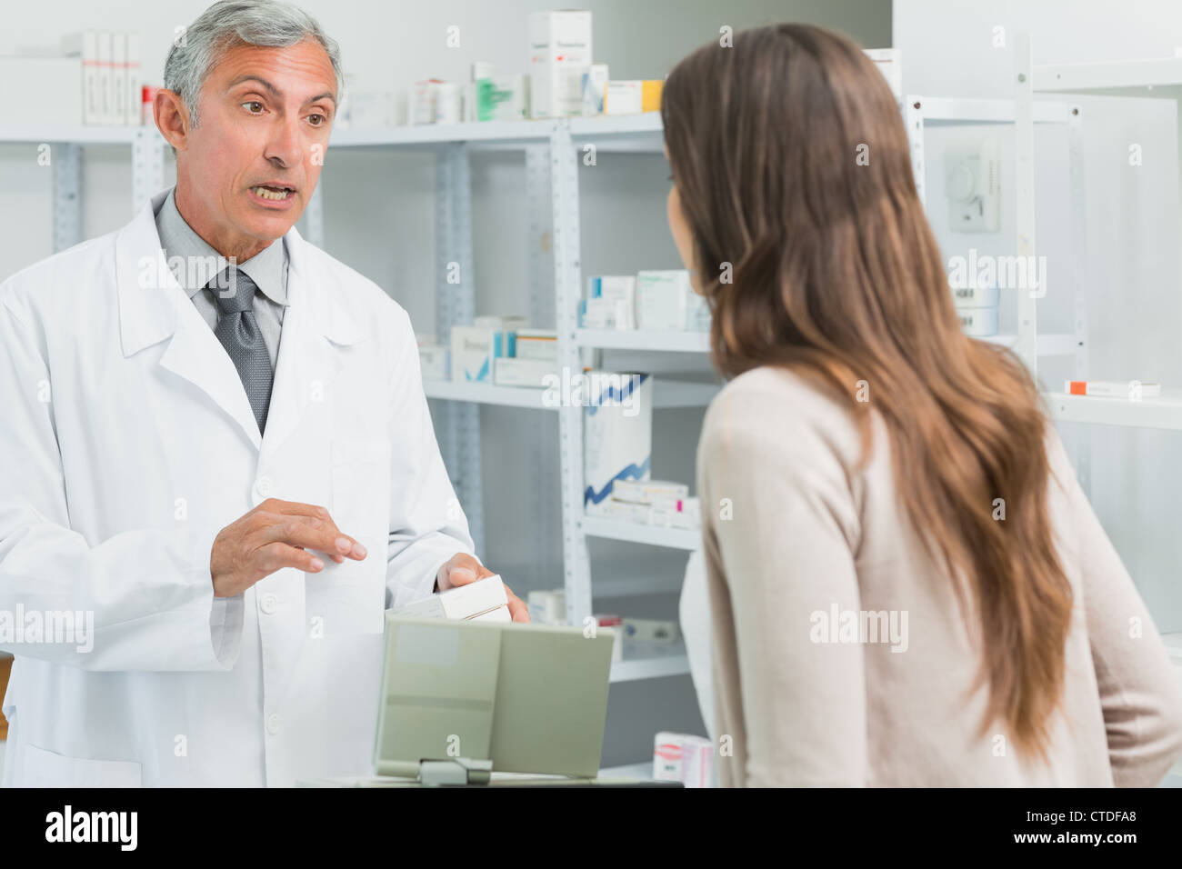 Pharmacist talking hi-res stock photography and images - Alamy