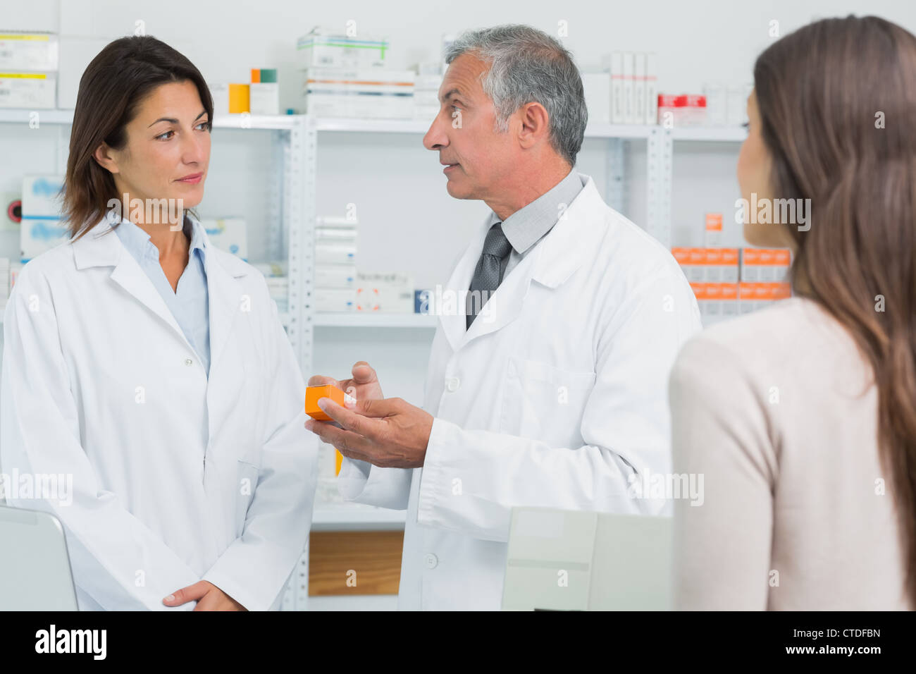 Pharmacist talking hi-res stock photography and images - Alamy