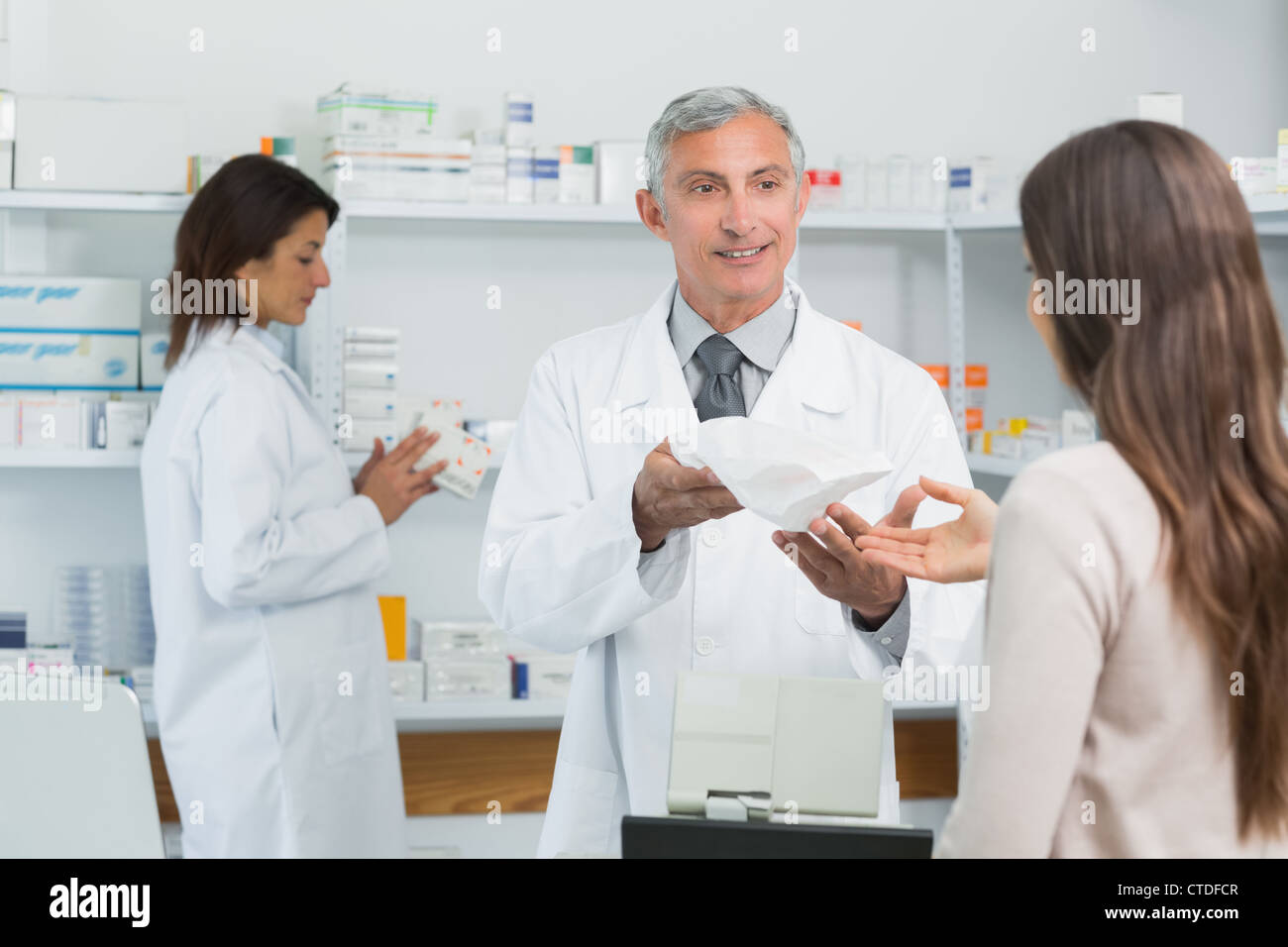 Giving Medicine High Resolution Stock Photography and Images - Alamy