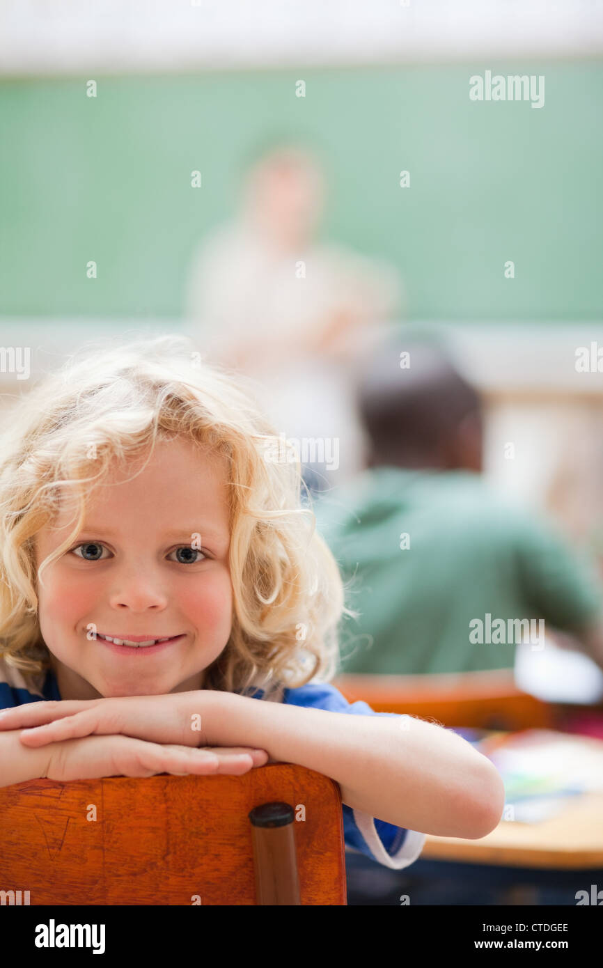 Schoolboy not paying attention to teacher Stock Photo - Alamy
