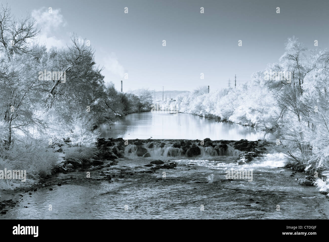 A toned photograph of the South Platte river running through the city ...