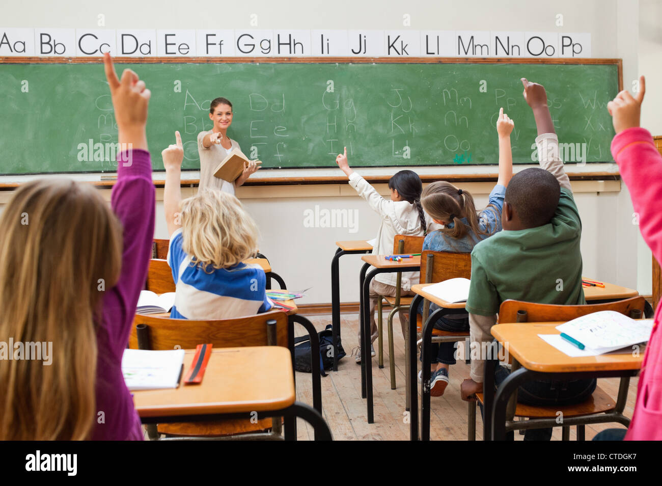 Child Raising Hand Back Stock Photos & Child Raising Hand Back Stock ...