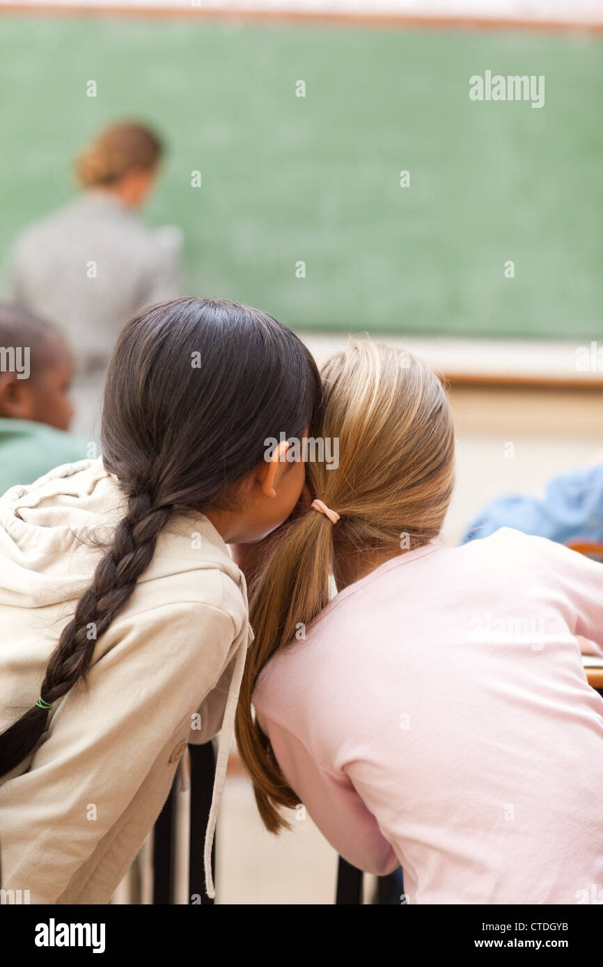 Students talking during lesson Stock Photo - Alamy