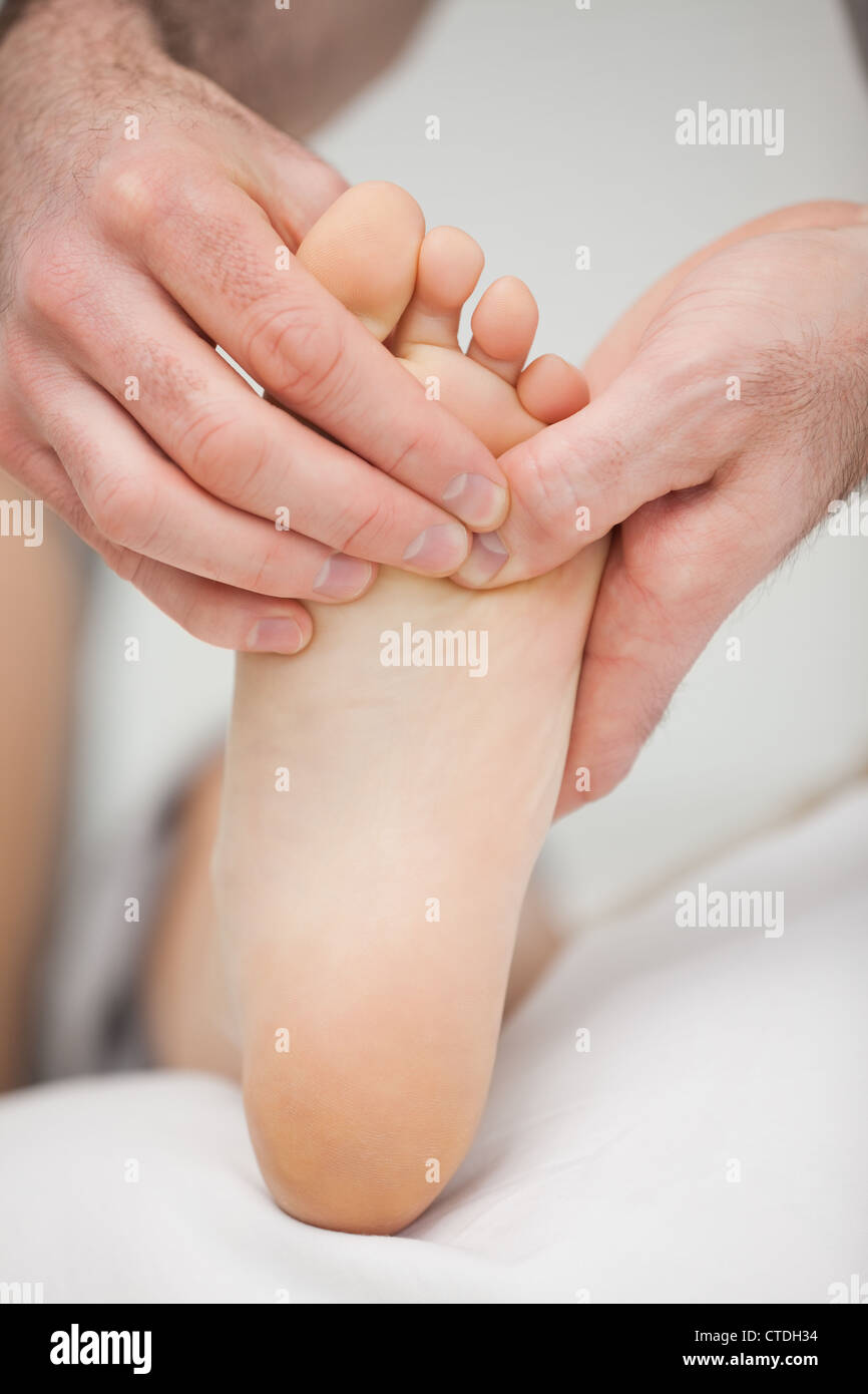 Woman toes touched hi-res stock photography and images - Alamy