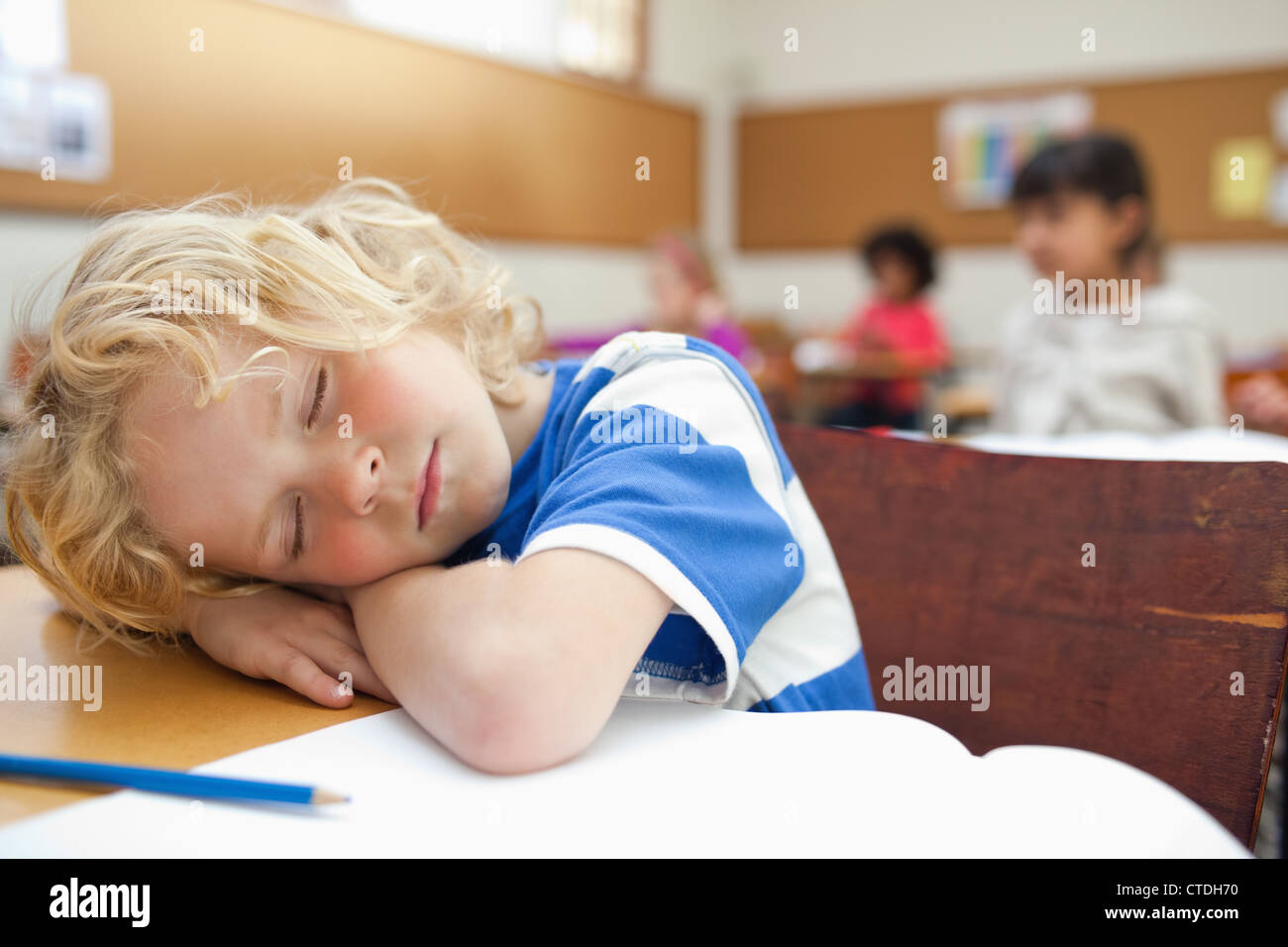 Boy asleep classroom hi-res stock photography and images - Alamy