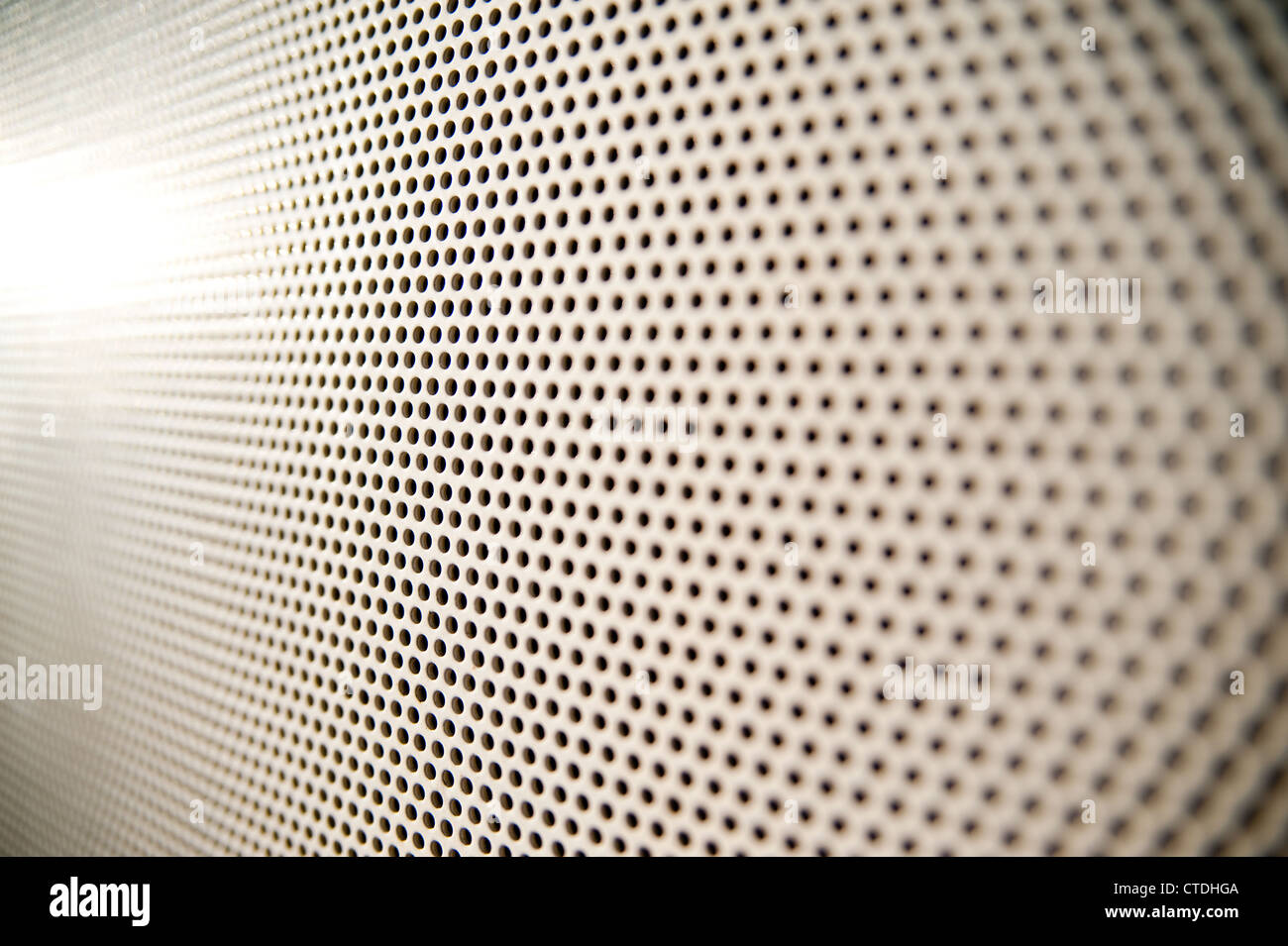 close up of perforated pattern with selective focus Stock Photo - Alamy