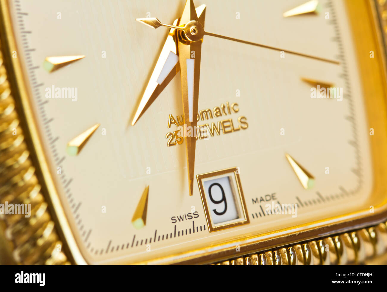 Expensive gold swiss watch close up Stock Photo - Alamy