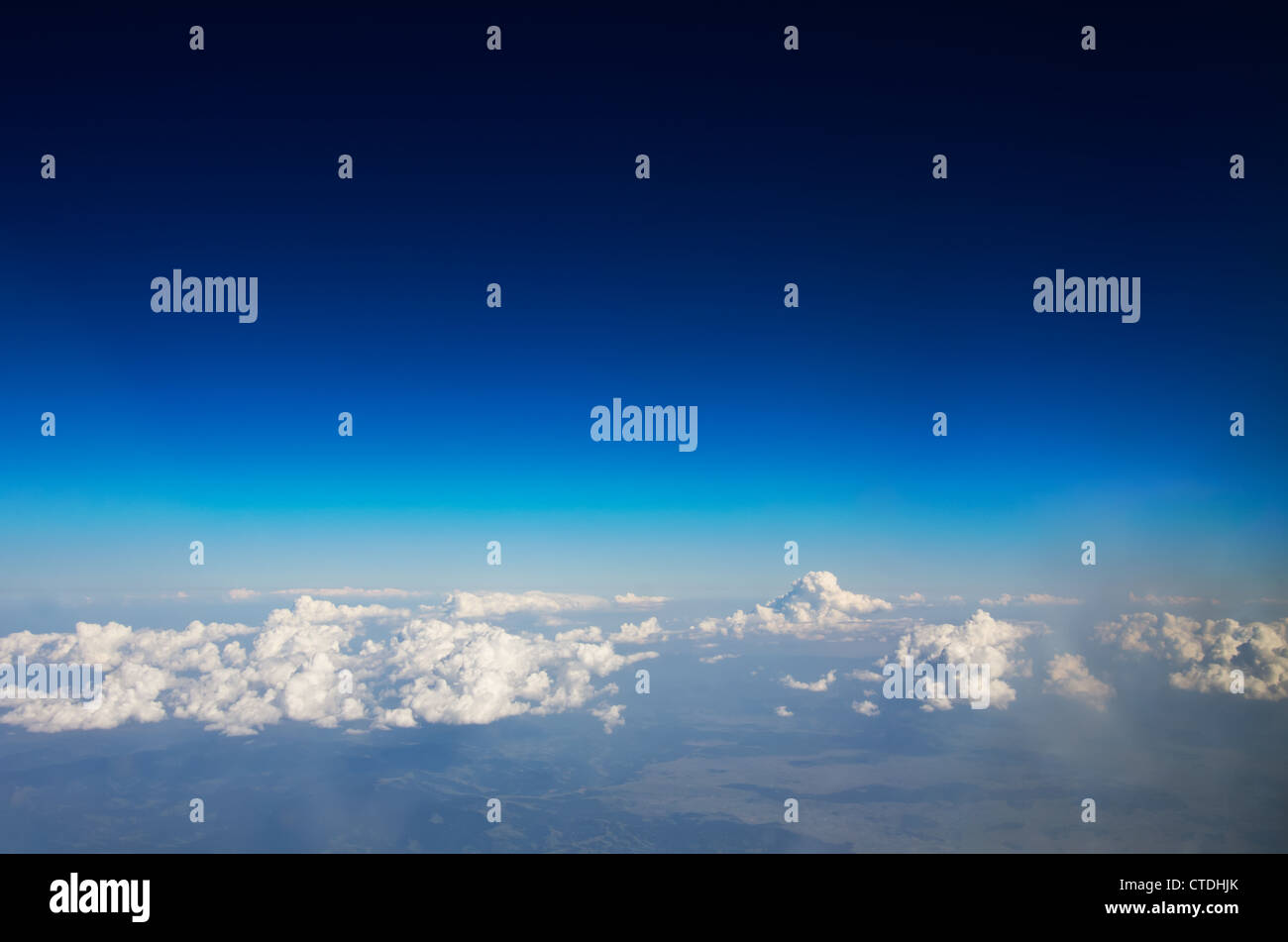 Blue sky above white clouds Stock Photo - Alamy