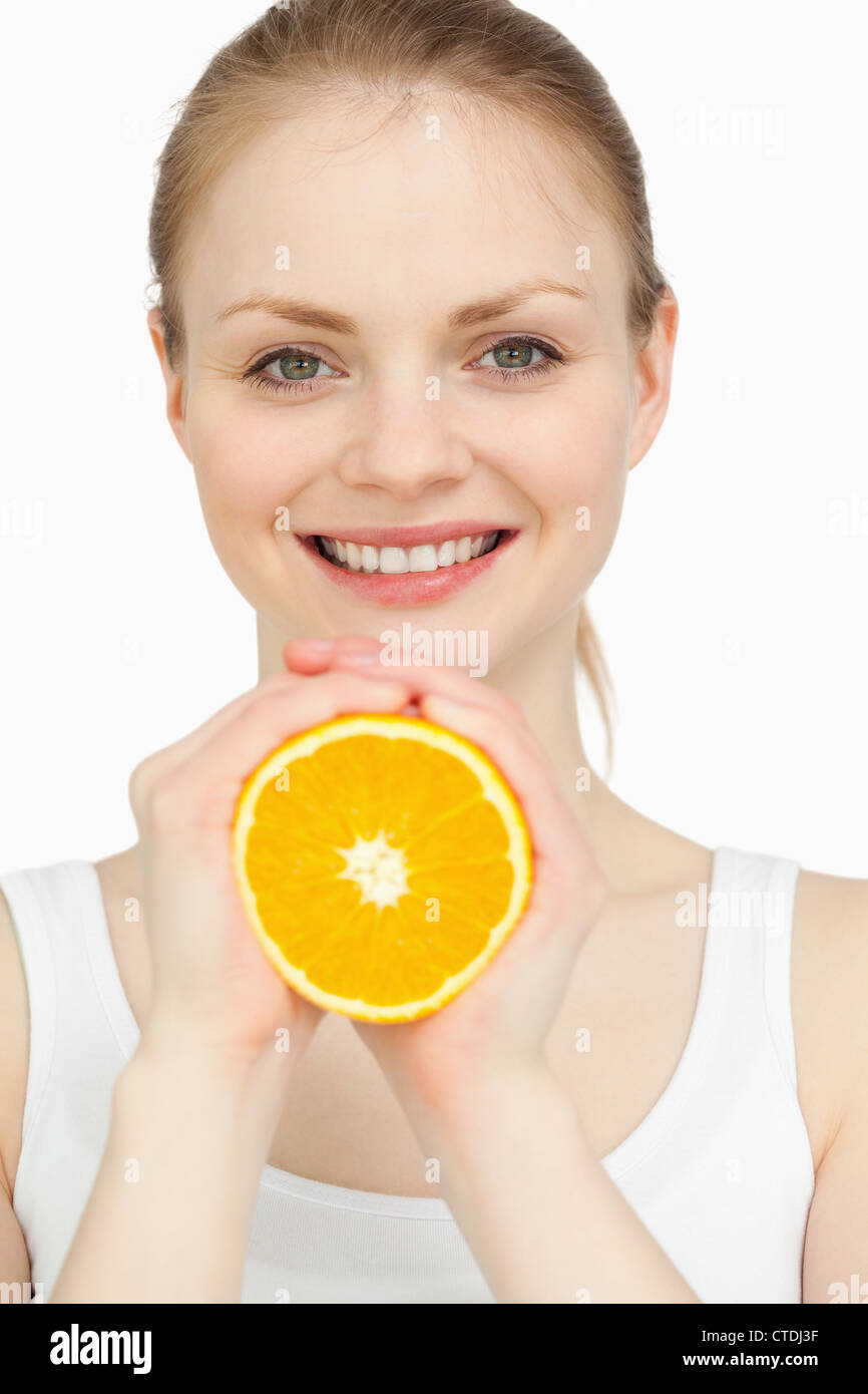 Female hands placing orange hi-res stock photography and images - Alamy