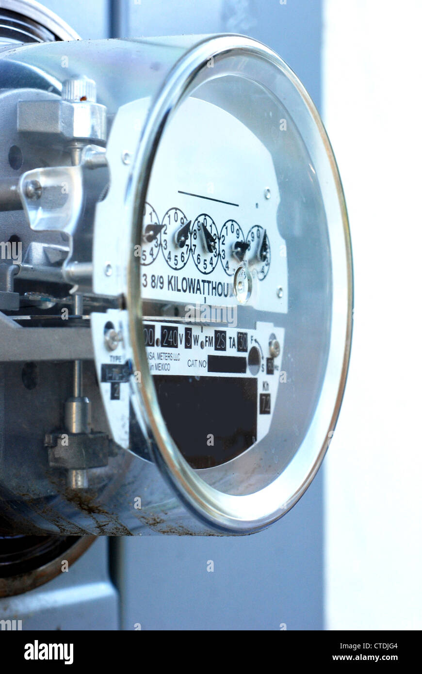 Electric meter, closeup, on outside wall Stock Photo - Alamy