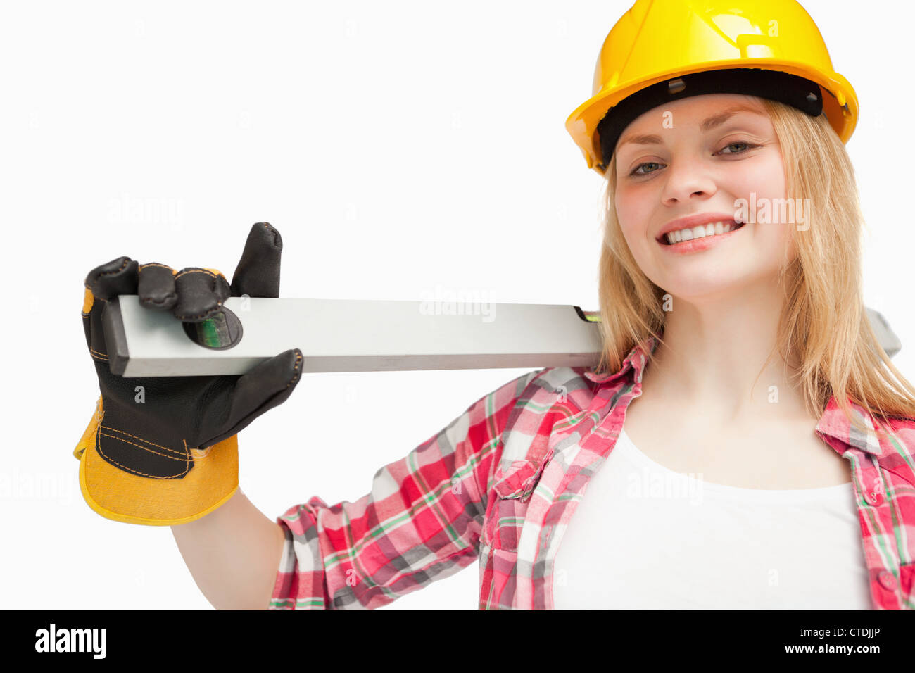 Young woman holding a spirit level Stock Photo - Alamy