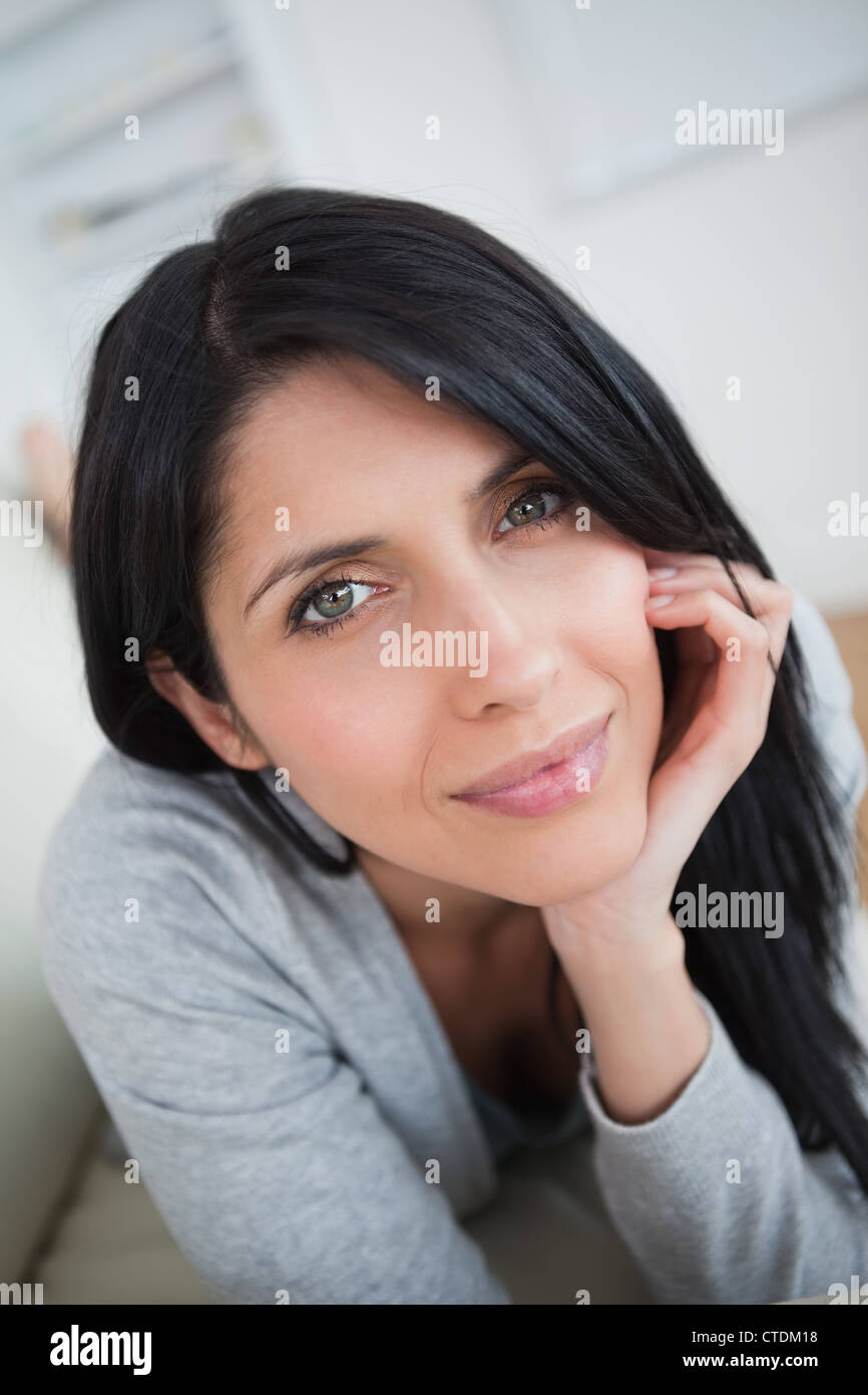 Woman holding head fist on hi-res stock photography and images - Alamy