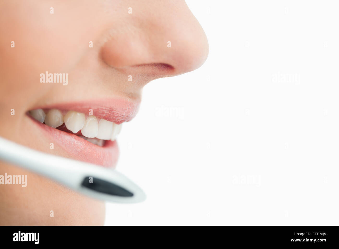 Side view of a mouth speaking in headset Stock Photo - Alamy