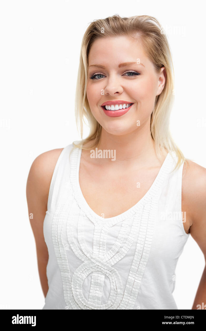 Joyful blonde woman standing upright Stock Photo - Alamy