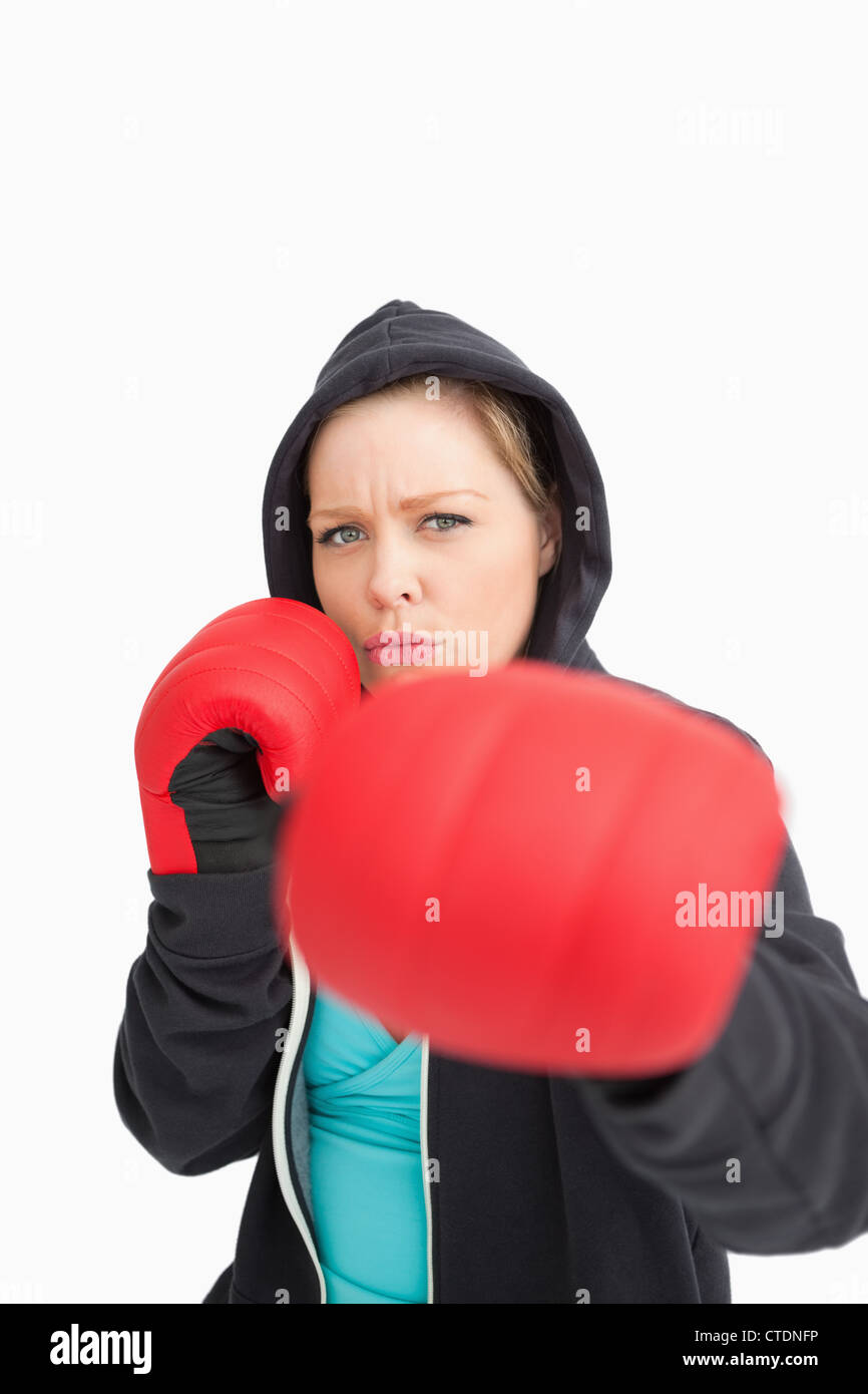 Concentrated woman boxing Stock Photo - Alamy