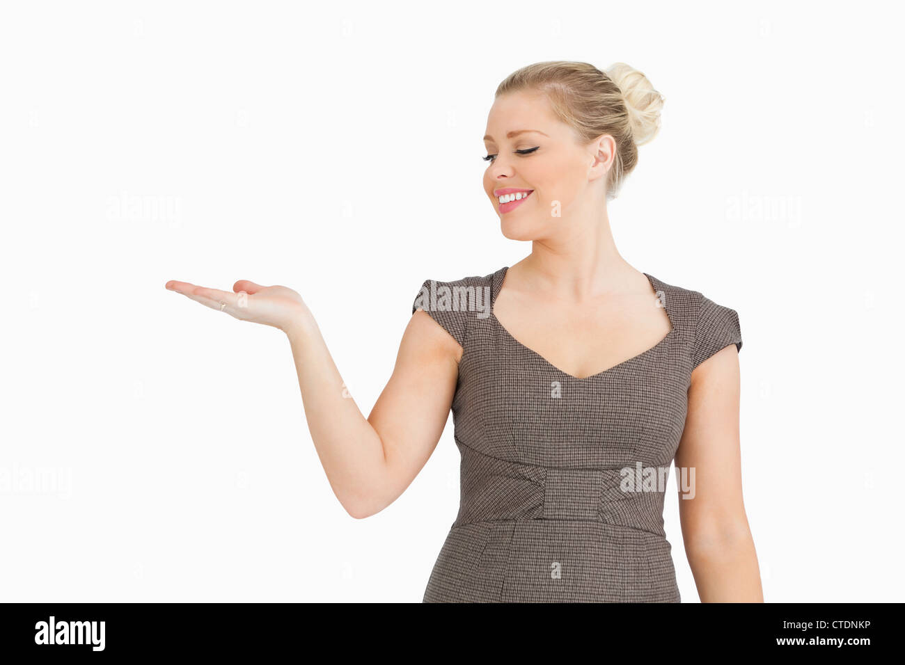 Woman presenting with her hand Stock Photo - Alamy