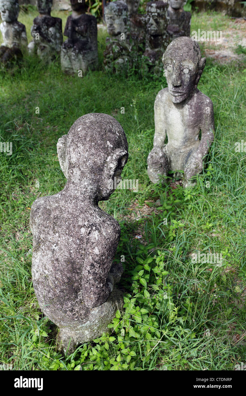 Ancient batak stone statue tomok hi-res stock photography and images ...
