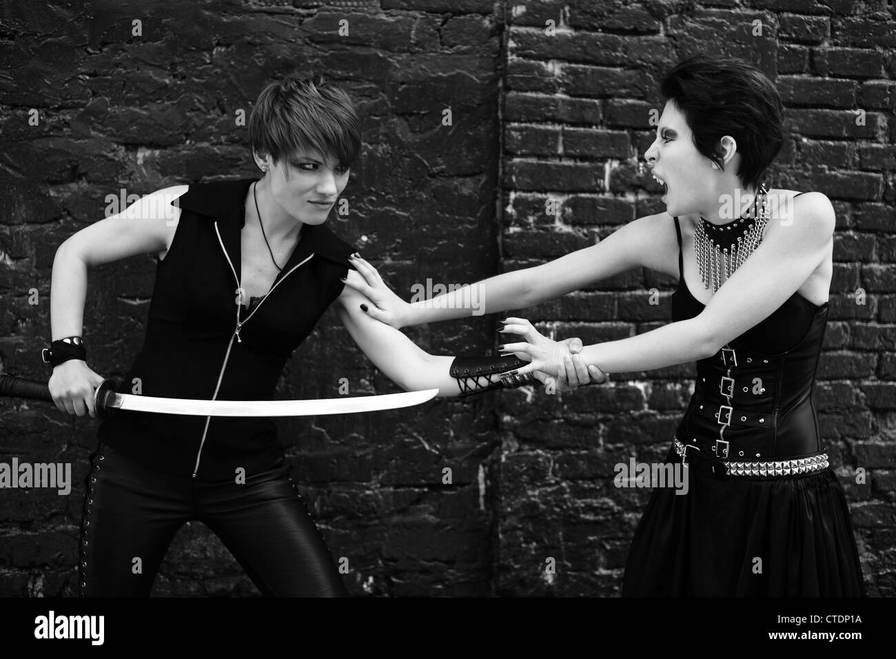 fight against vampire: vampire and young warrior woman with sword Stock ...