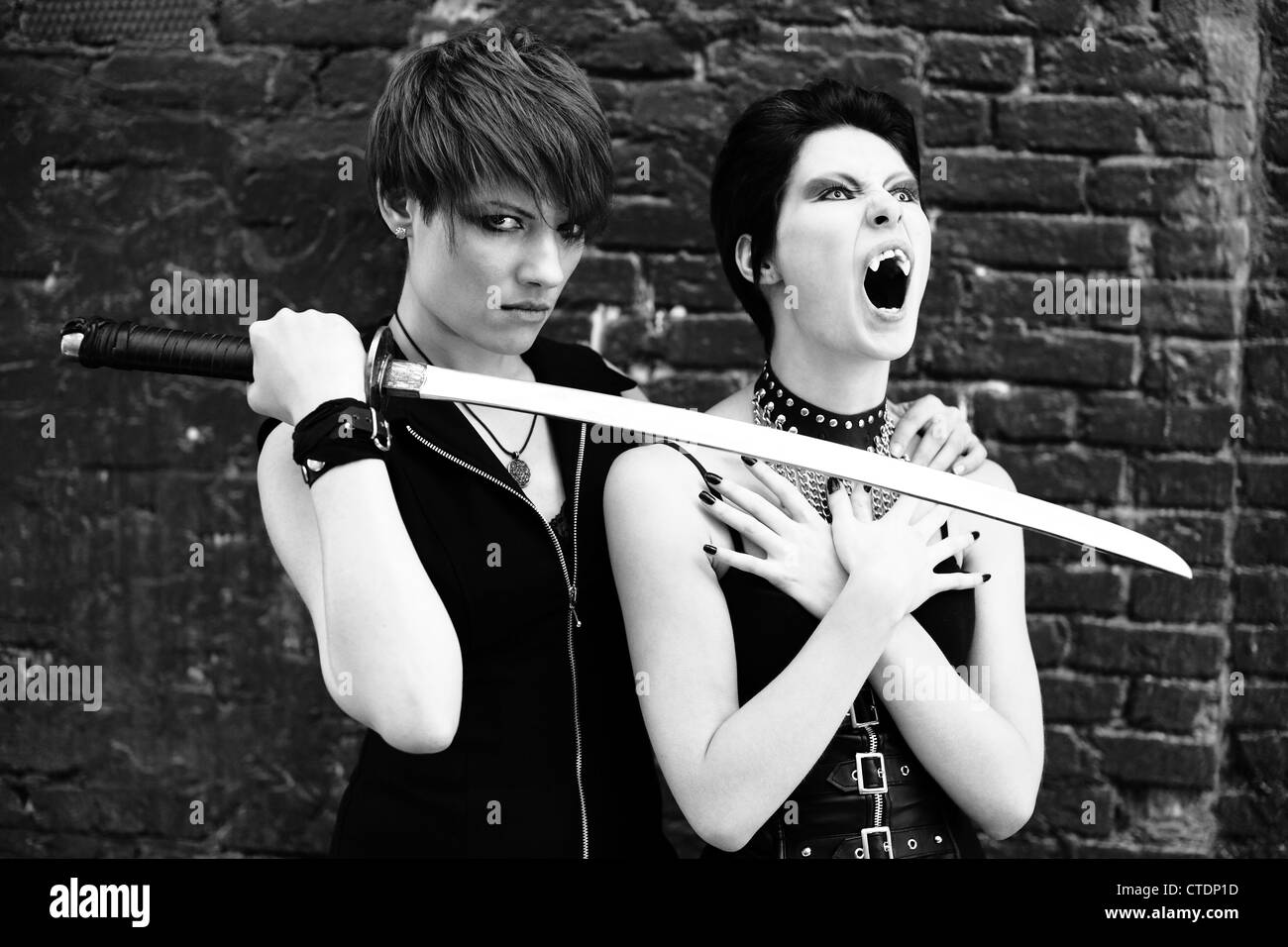 fight against vampire: vampire and young warrior woman with sword Stock ...