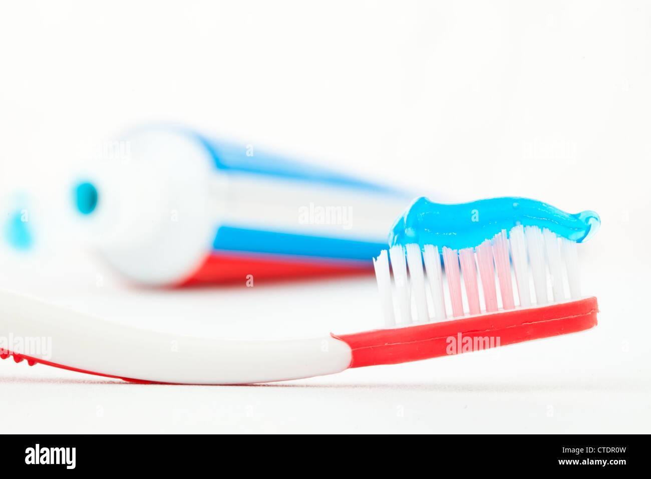 Red tube of toothpaste hi-res stock photography and images - Alamy