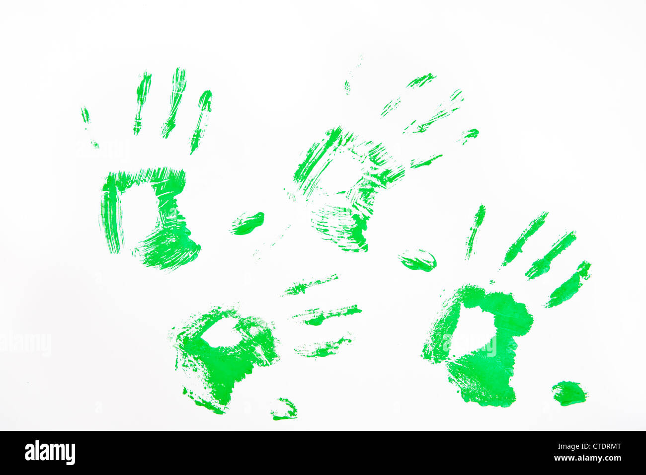 Four green handprints Stock Photo - Alamy