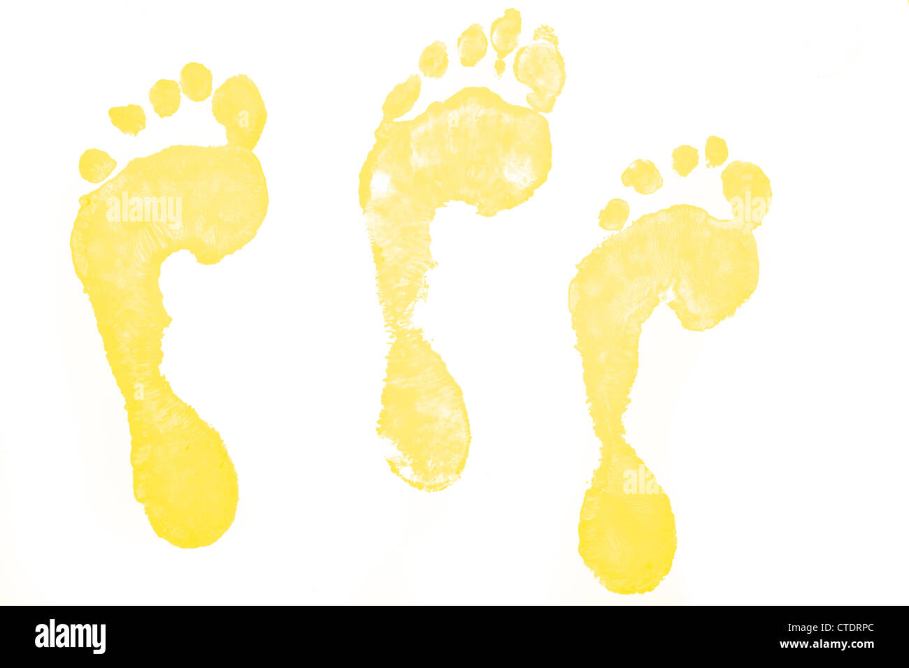 Three yellow footprints Stock Photo - Alamy