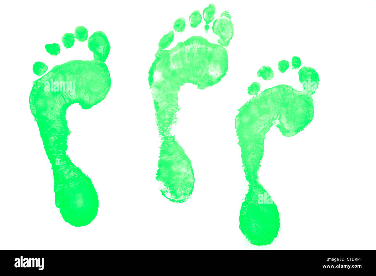 Three green footprints Stock Photo - Alamy