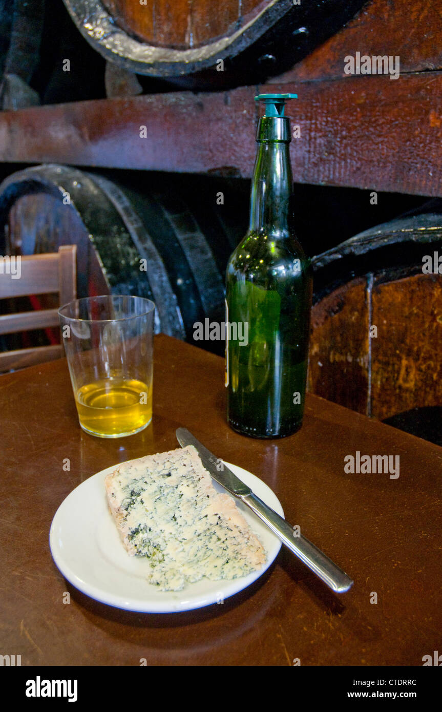 Spanish appetizer: Cabrales cheese serving and cider. Asturias, Spain ...