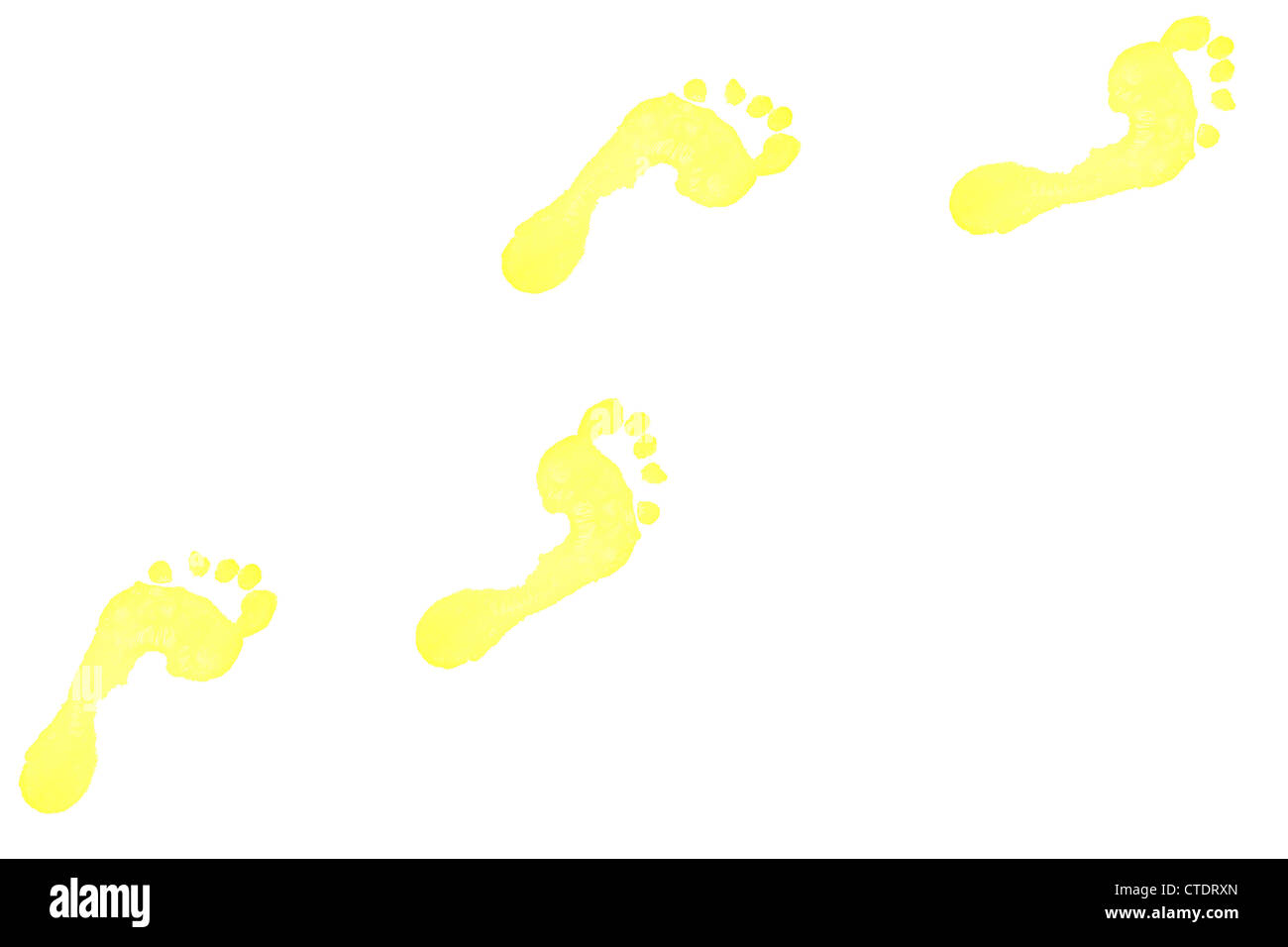 Four yellow footprints Stock Photo - Alamy