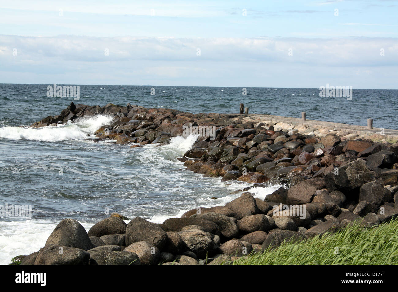 Rocks and Sea Barrage on the coast of the Danish island Bornholm Stock ...