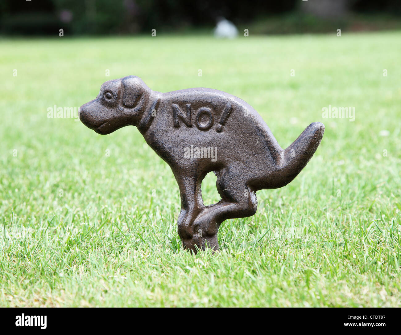 humorous cast iron sign don't allow dogs to poop upon grass seen in ...