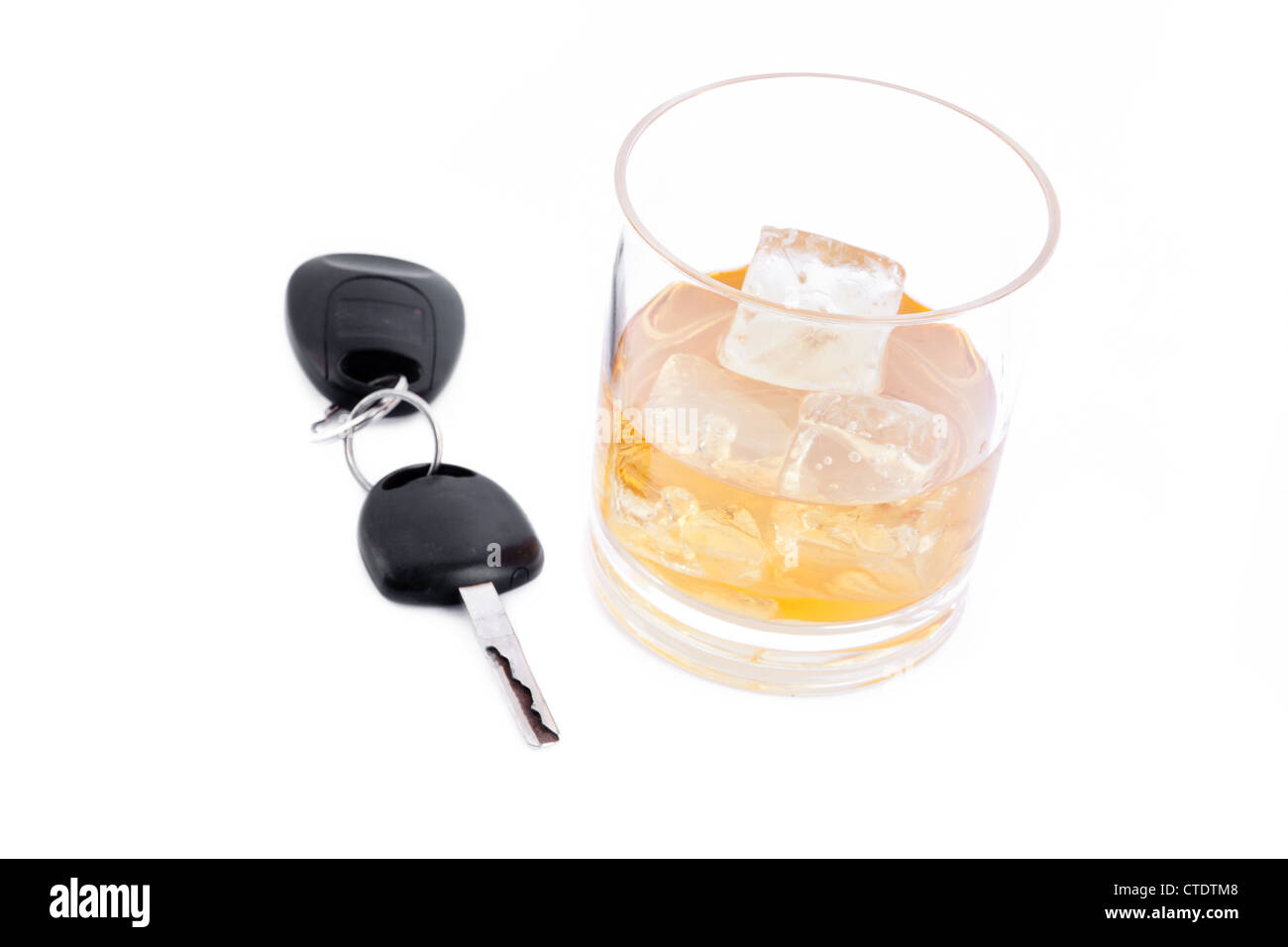 Car key and a whiskey Stock Photo - Alamy
