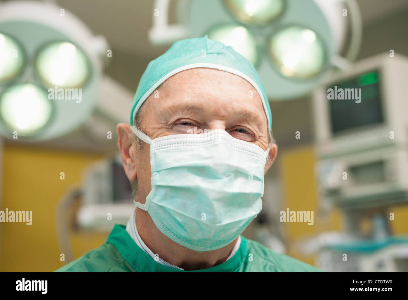 Portrait of a smiling surgeon Stock Photo - Alamy
