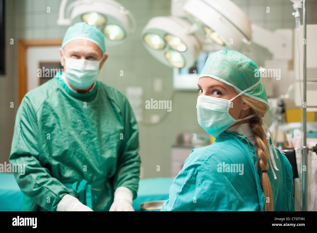 Two surgeon wearing surgical equipment Stock Photo - Alamy