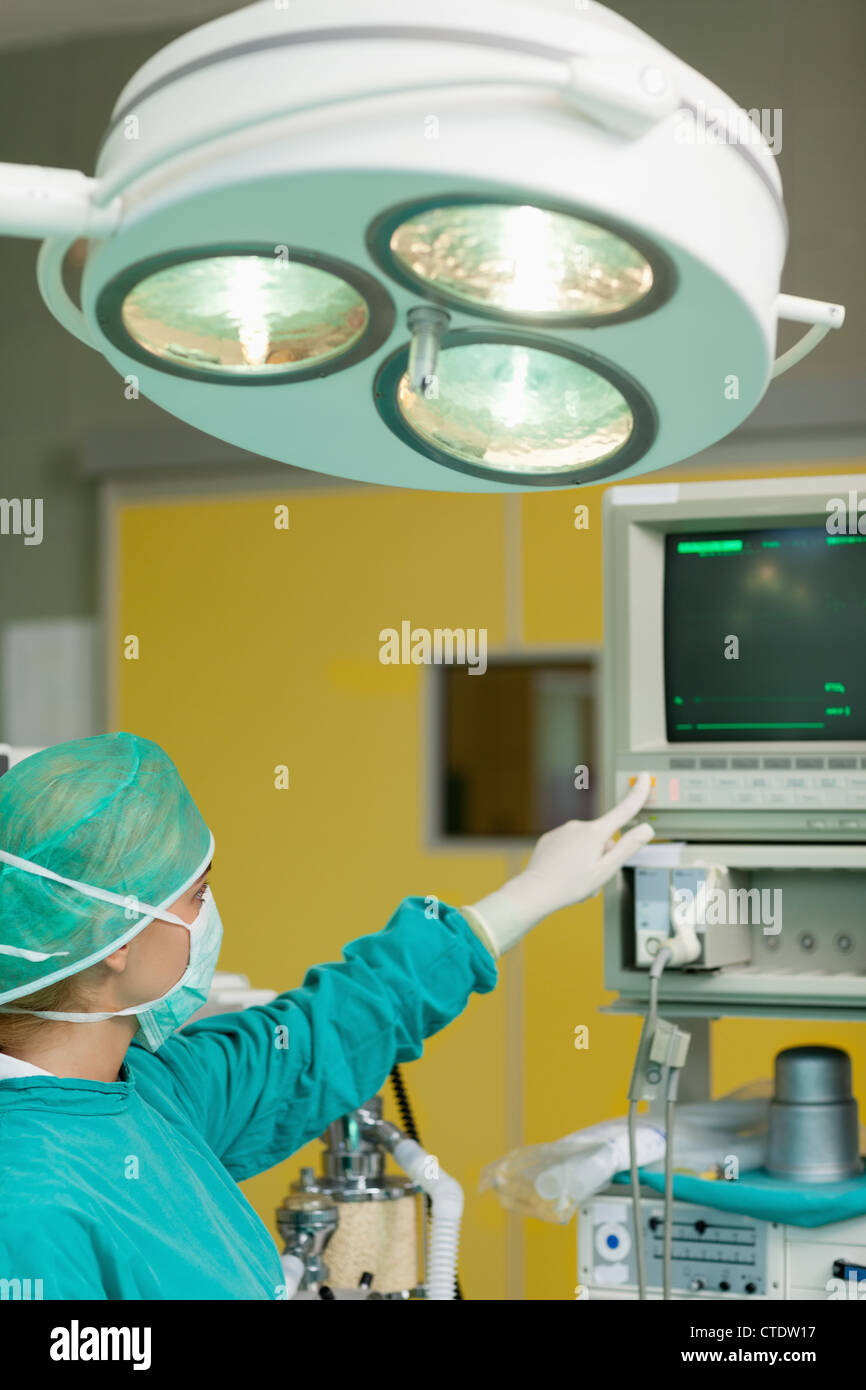 Surgeon checking monitor hi-res stock photography and images - Alamy