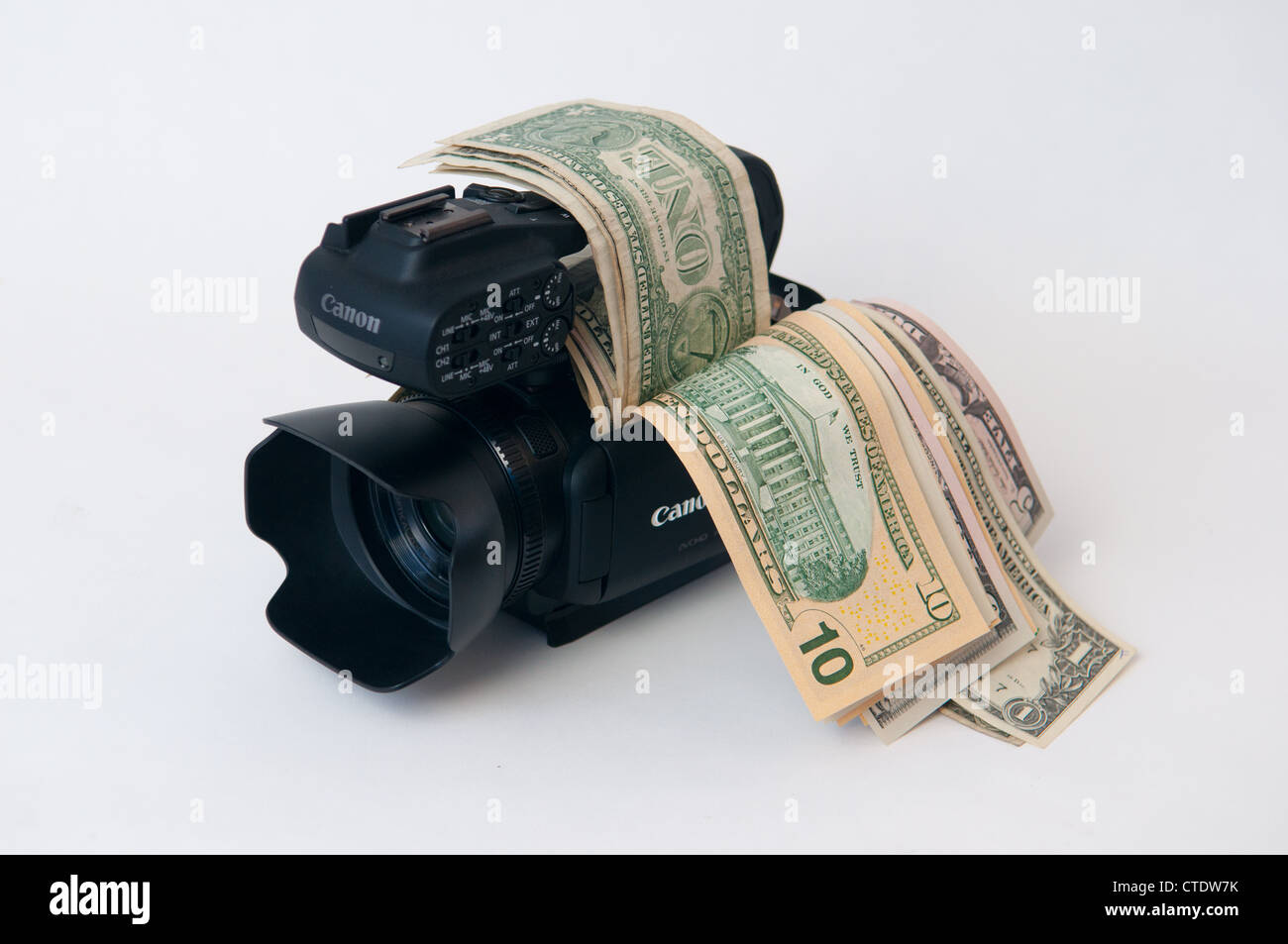 A Canon XA10 camcorder with money Stock Photo - Alamy