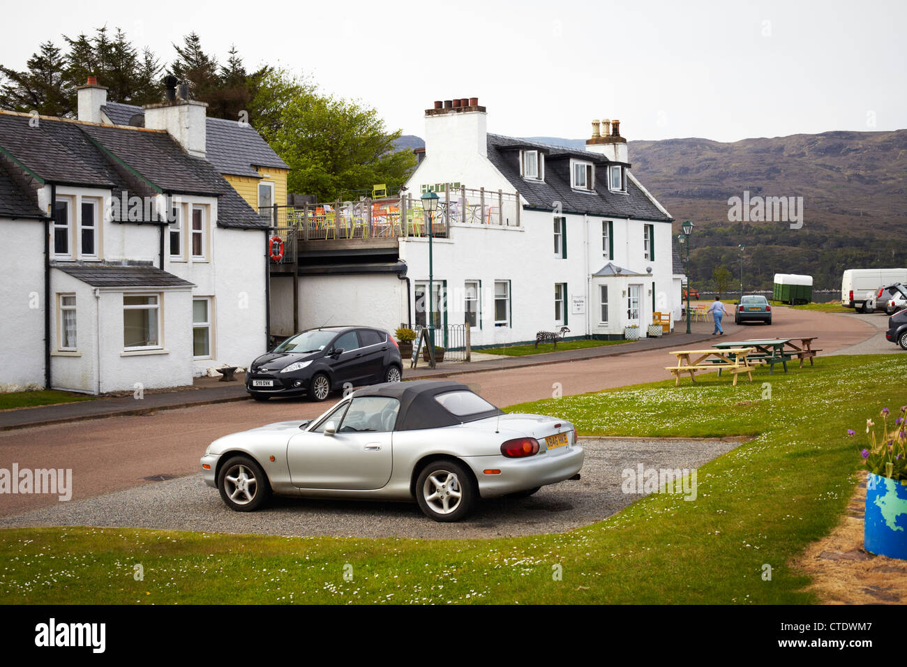 Tigh an Eilean Hotel at Shieldaig. Mazda MX5 in foreground. Scotland ...