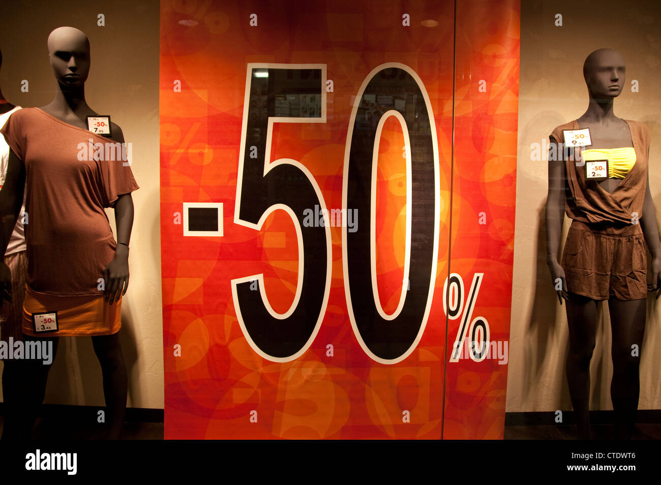 Sales sign in shop window in Florence, Italy Stock Photo - Alamy