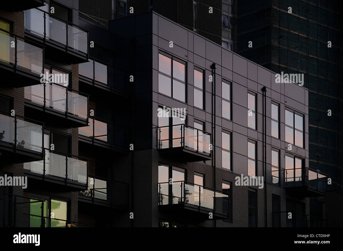 Sunset reflections on a minimal architecture of a residential building ...
