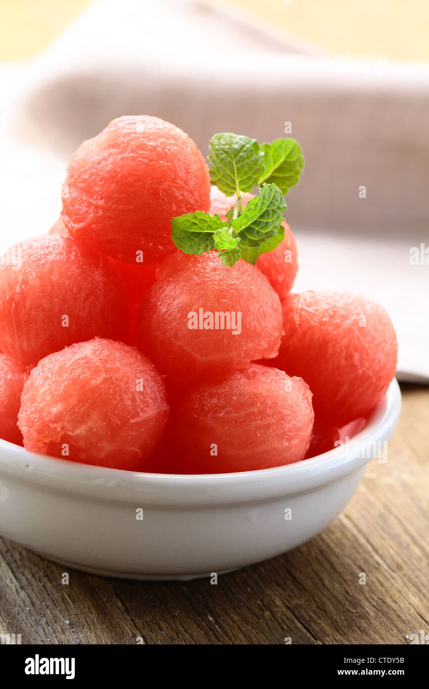 Fruit salad with watermelon balls and mint Stock Photo - Alamy