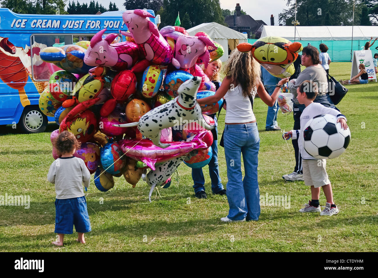 Balloon seller selling her balloons at Lloyd Park in Croydon Surrey ...