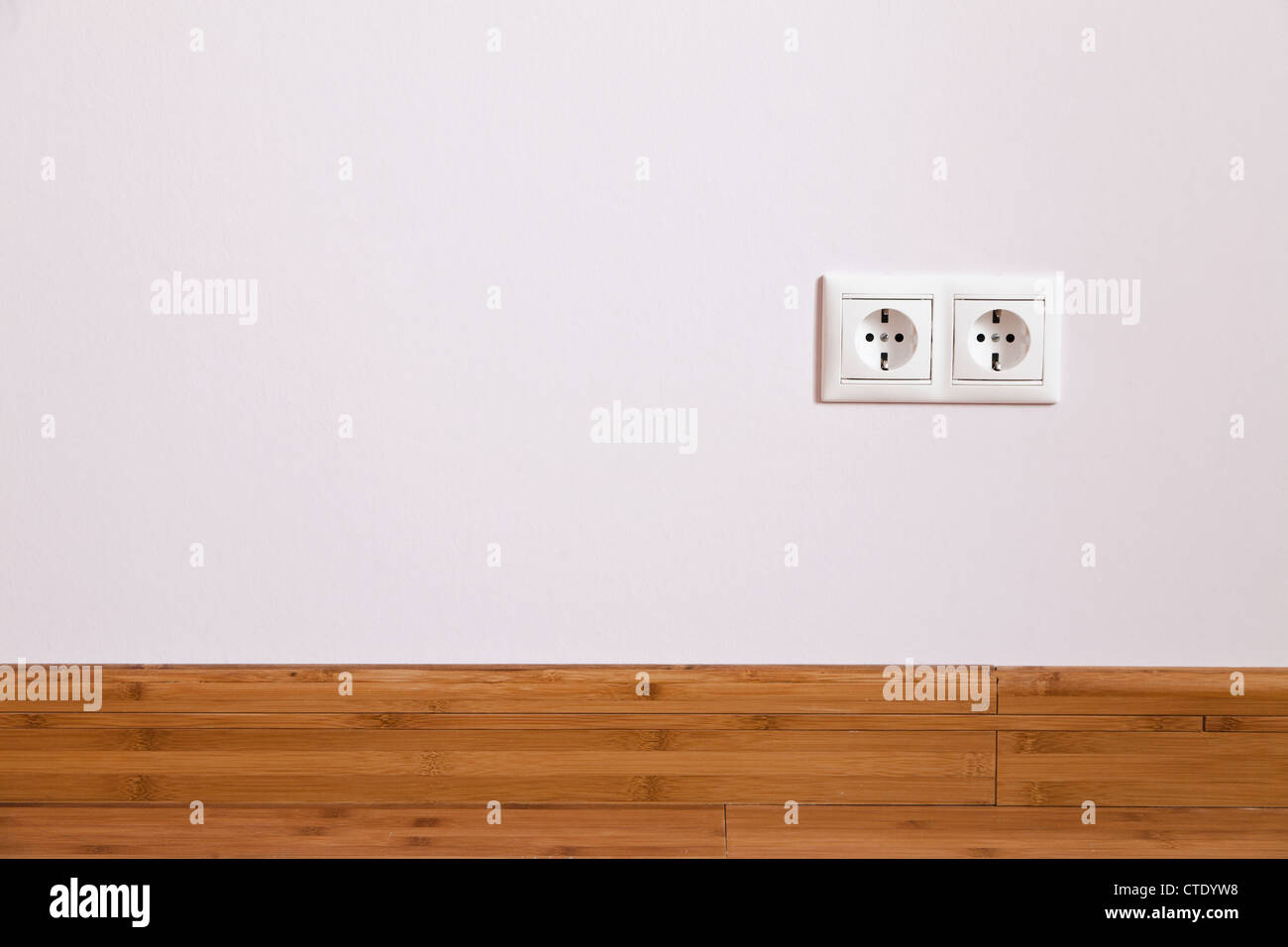 Interior wall with domestic power outlet Stock Photo - Alamy