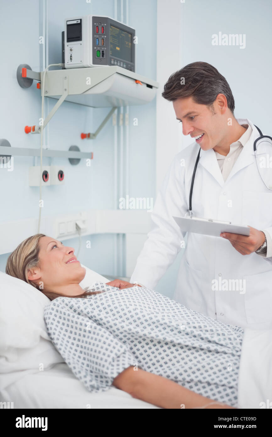 Doctor speaking to his patient Stock Photo - Alamy