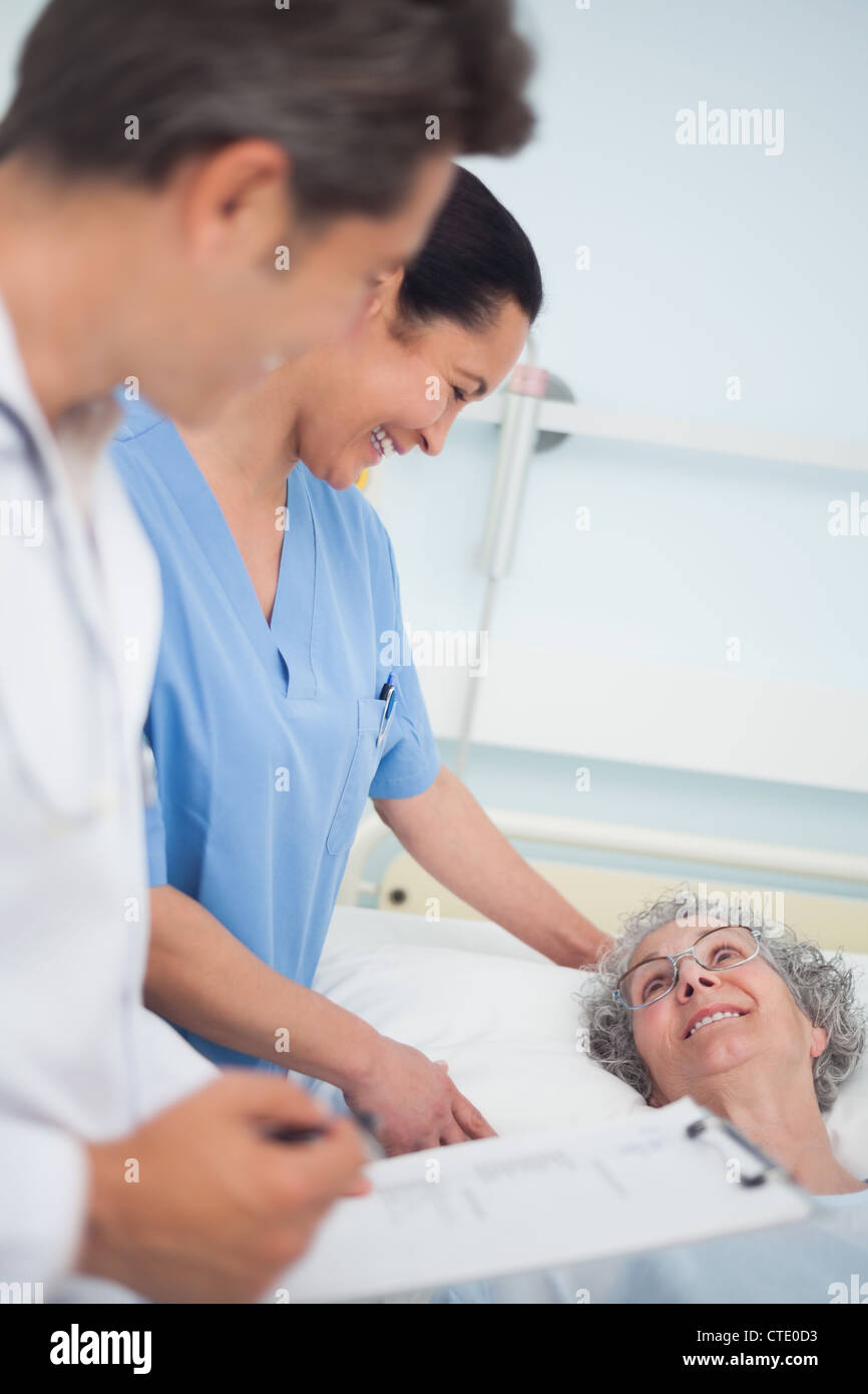 Man laughing hospital bed hi-res stock photography and images - Alamy