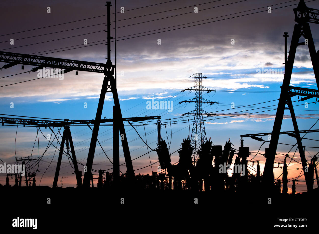 Power lines at sunset Stock Photo - Alamy