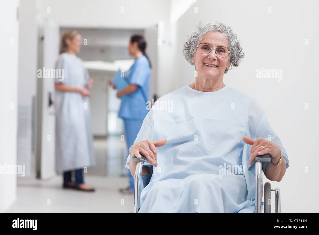 Elderly patient in corridor Stock Photo - Alamy