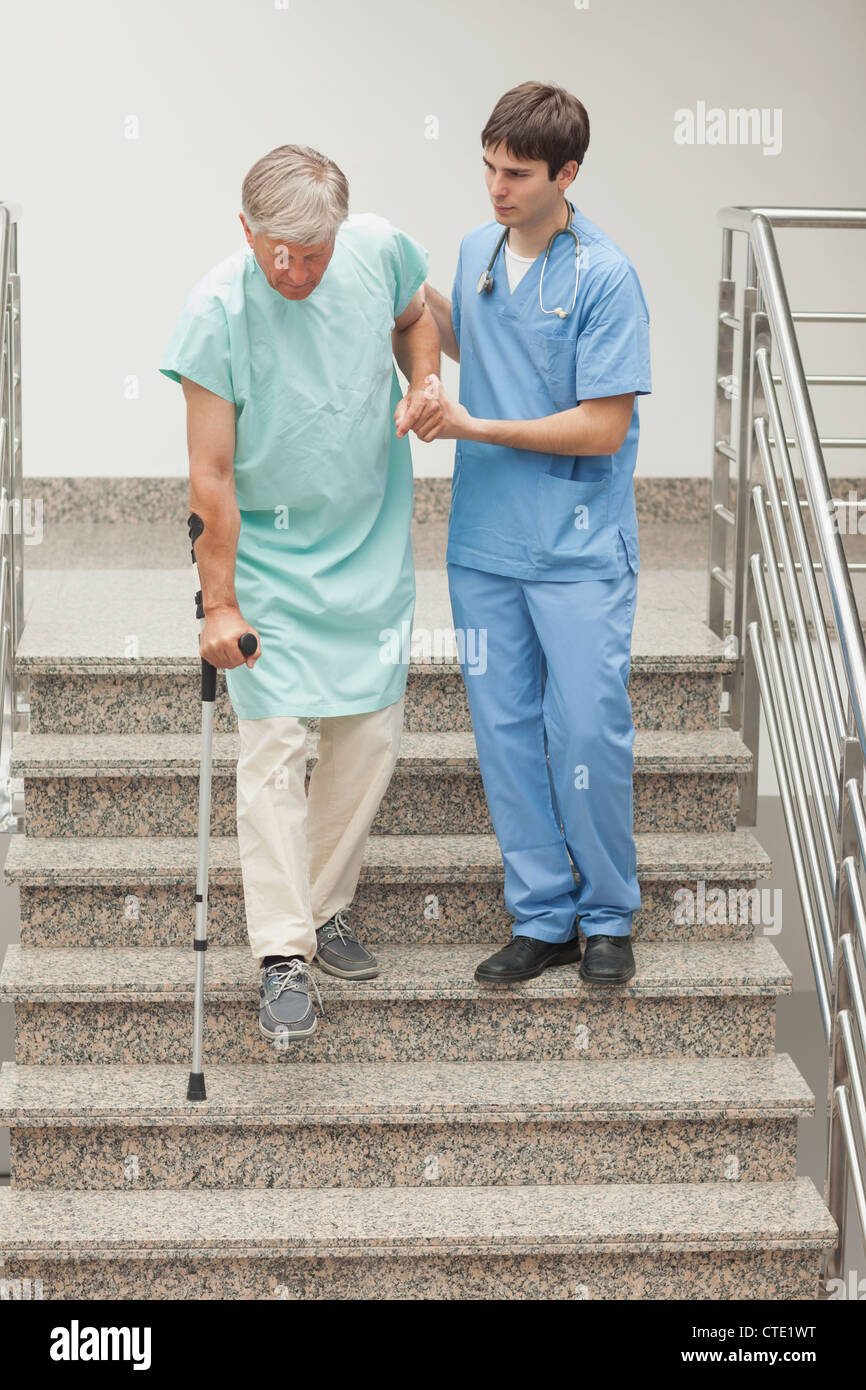 Assisting patient stairs hi-res stock photography and images - Alamy