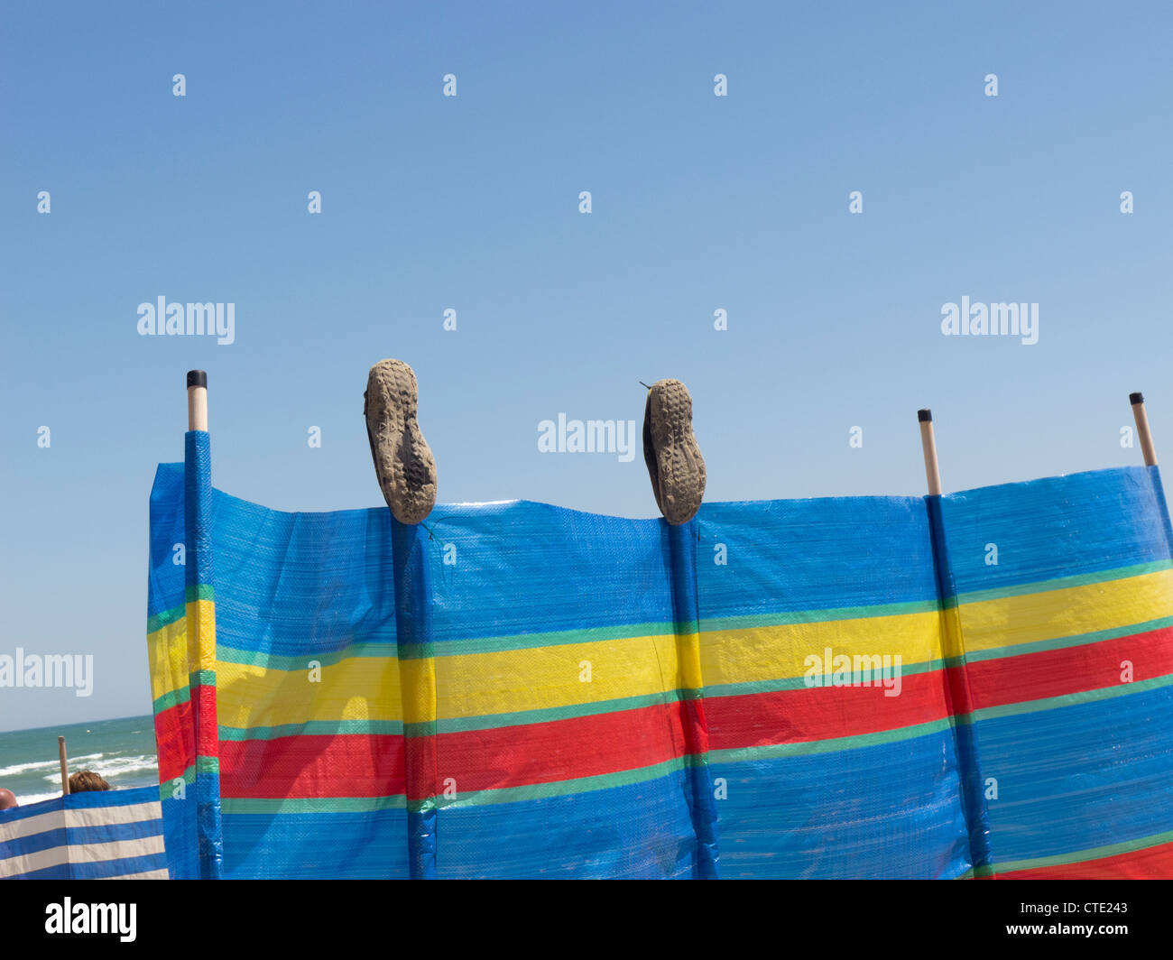 Wind breaker on British beach Stock Photo - Alamy