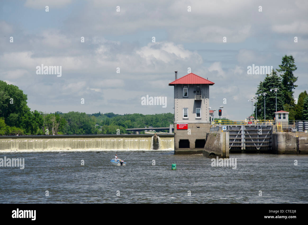 New York, Troy. Hudson River, fisherman in front of Federal Lock Stock ...