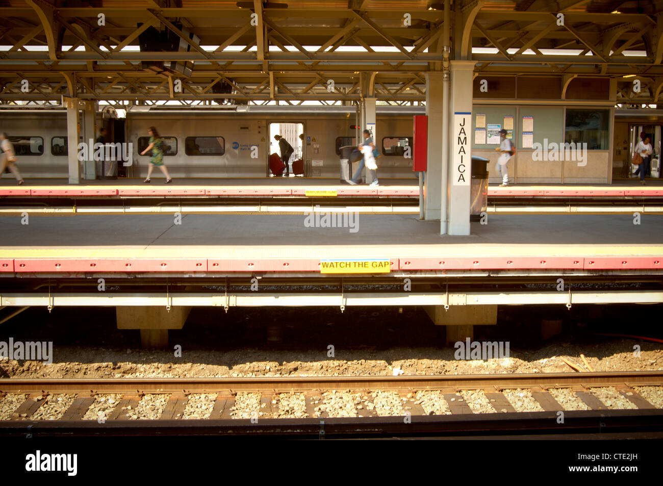 platform and train on a railway station Stock Photo - Alamy